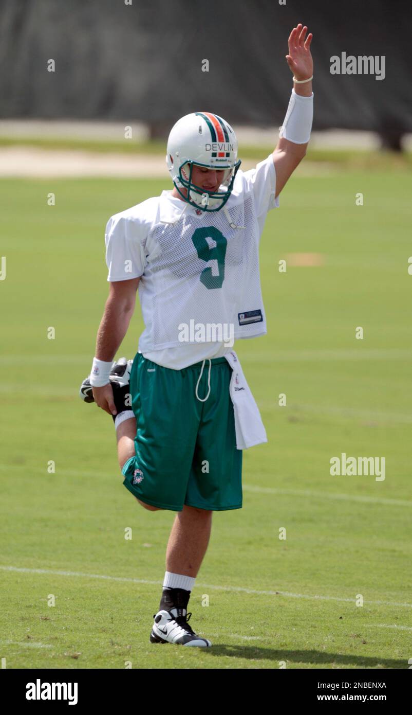 Miami Dolphins quarterback Pat Devlin stretches during the first day of ...