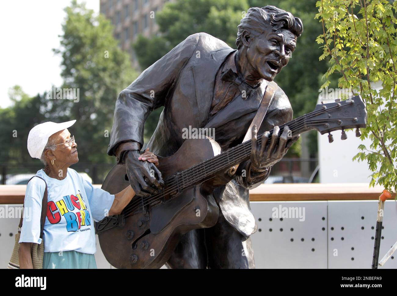 Ophelia Williams stands next to an 8-foot-tall statue of legendary ...