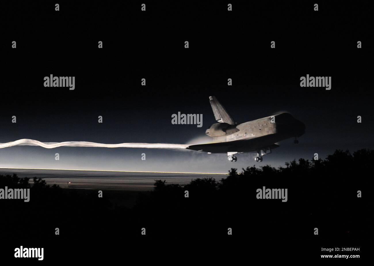 Space Shuttle Atlantis lands at the Kennedy Space Center at Cape ...