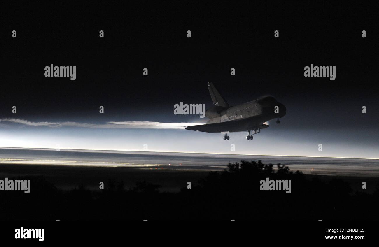 Space Shuttle Atlantis lands at the Kennedy Space Center at Cape ...