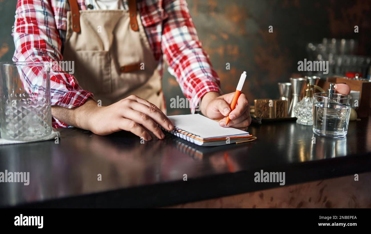 menu and cocktail glass on the bar counter Stock Photo - Alamy