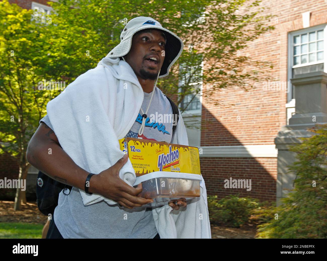 Carolina Panthers Tyrell Sutton carries snacks as he arrives at Wofford ...