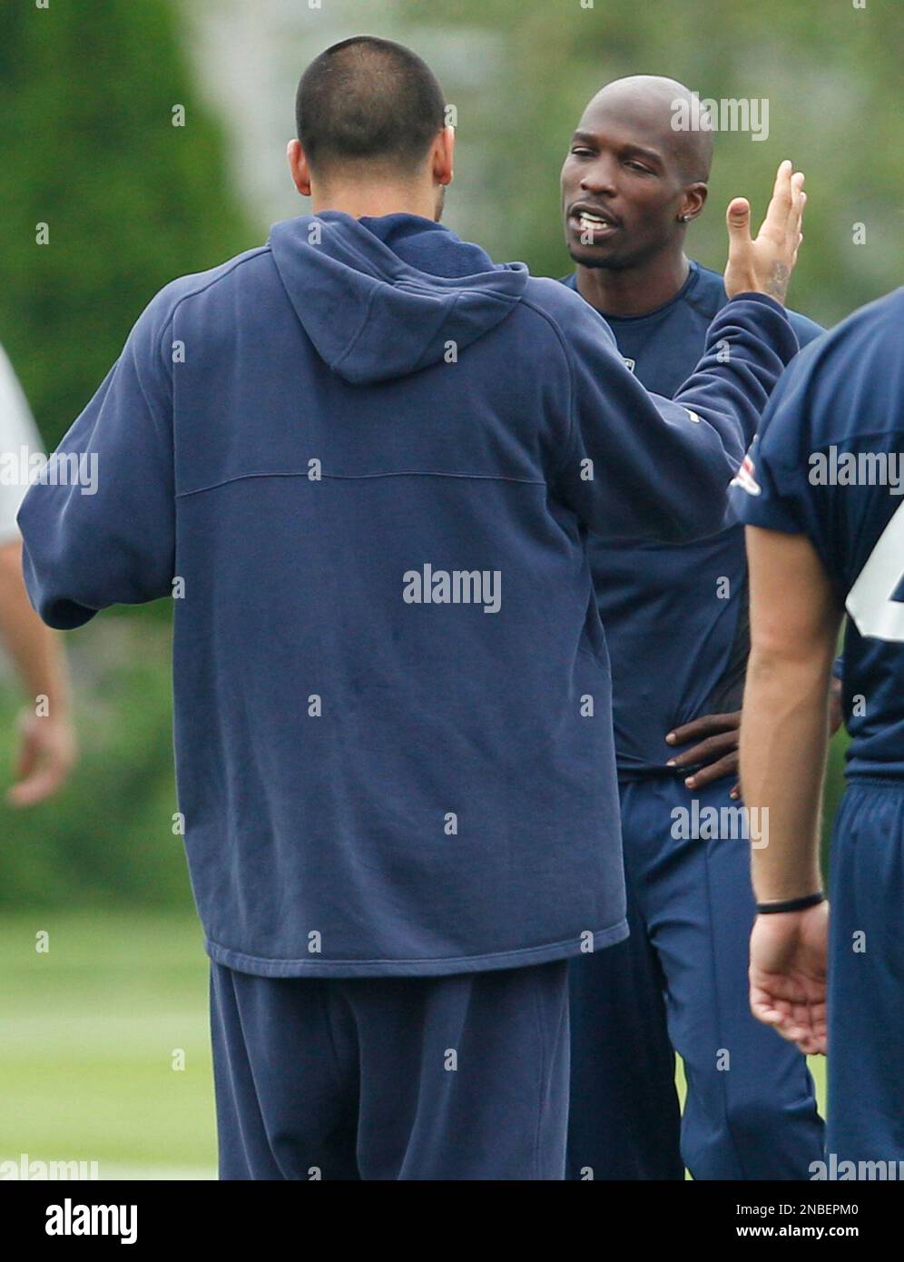 New England Patriots tight end Aaron Hernandez, left, who wears the ...
