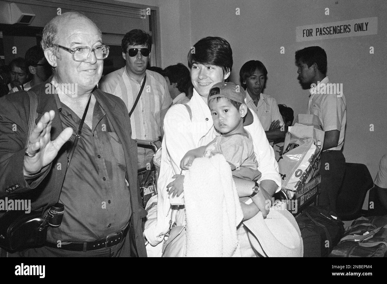 Lin Htut, a three-year-old Burmese boy separated from his conjoined twin sister in July, arrives ...