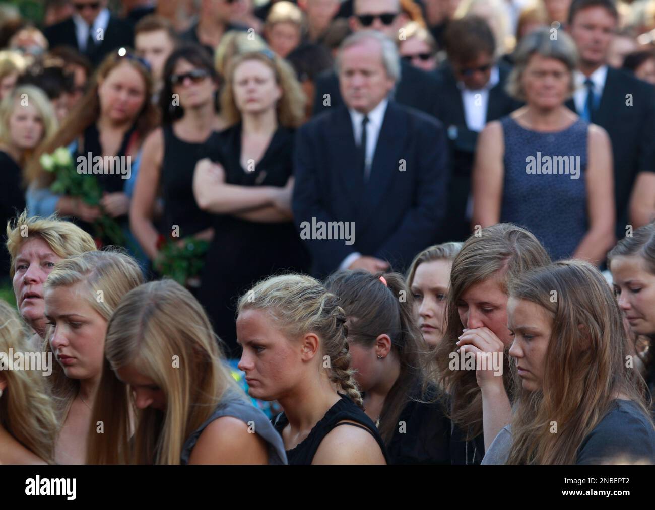 Mourners attend the funeral of Bano Abobakar Rashid, 18, the first ...