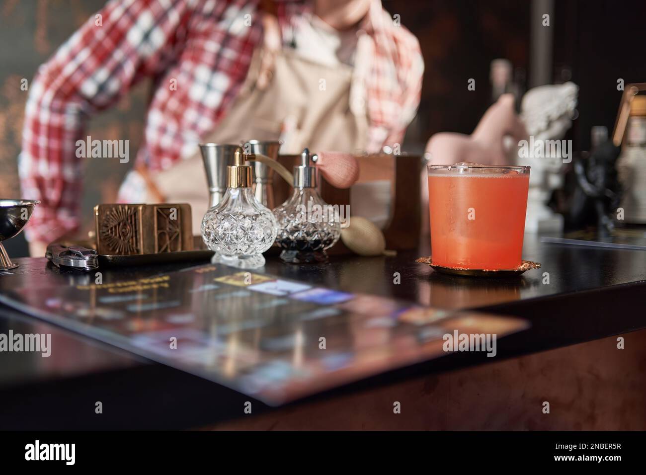 menu and cocktail glass on the bar counter Stock Photo - Alamy