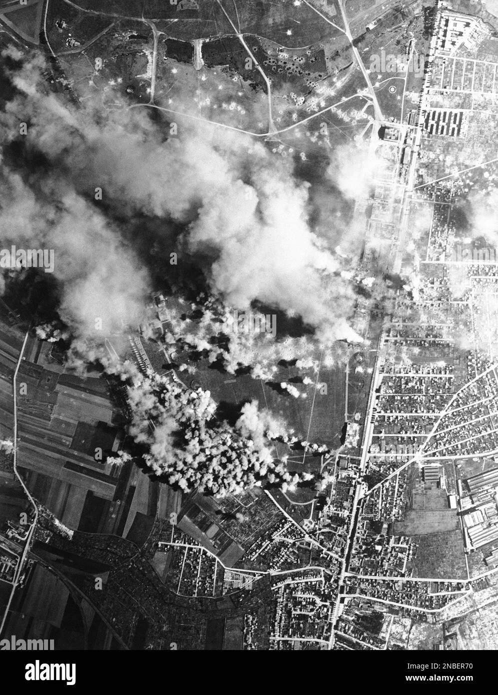 Row on row of bombs burst across Le Bourget Field at Paris, where ...