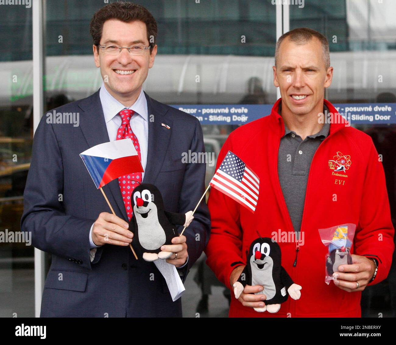 US Ambassador to Czech Republic Norman Eisen, left, and U.S. astronaut ...