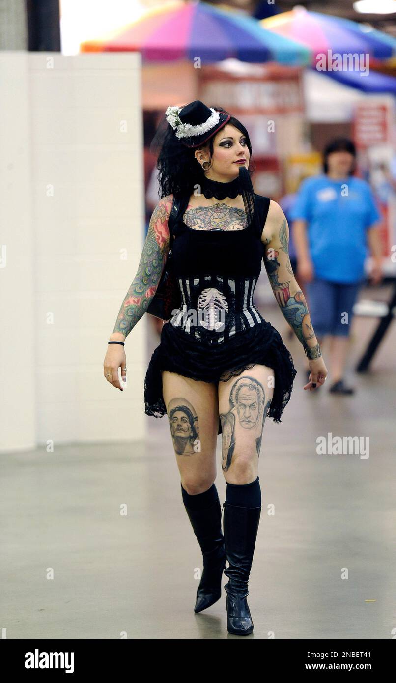 Candace Clark, 24, of Denver, walks through the first Denver County ...