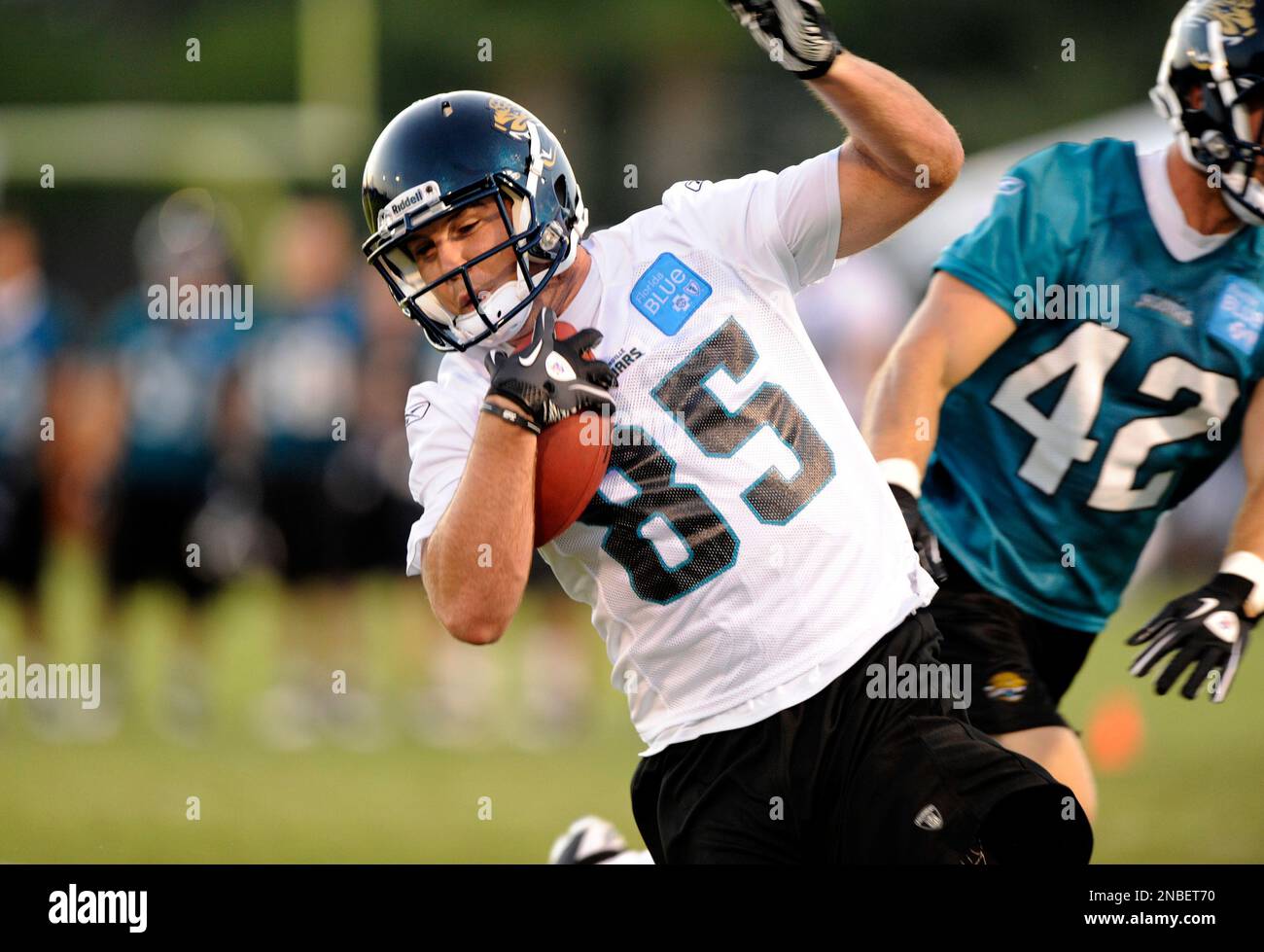Jacksonville Jaguars rookie tight end Tommy Gallarda (85) evades safety ...