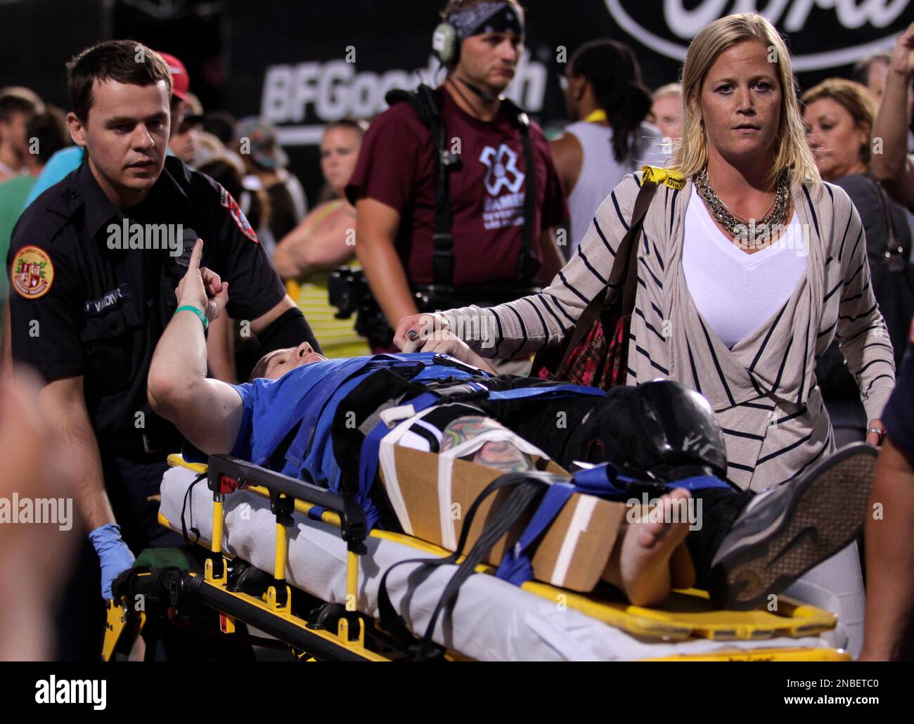 Chad Kagy is carried on a stretcher after he fell while competing in ...