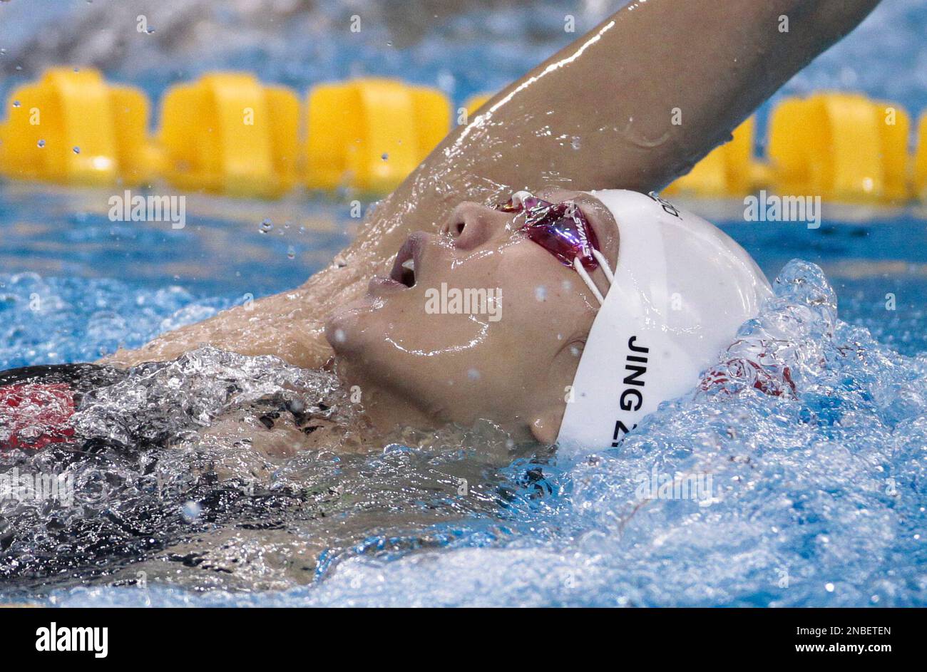 China's Zhao Jing swims in a women's 200m Backstroke heat at the FINA ...