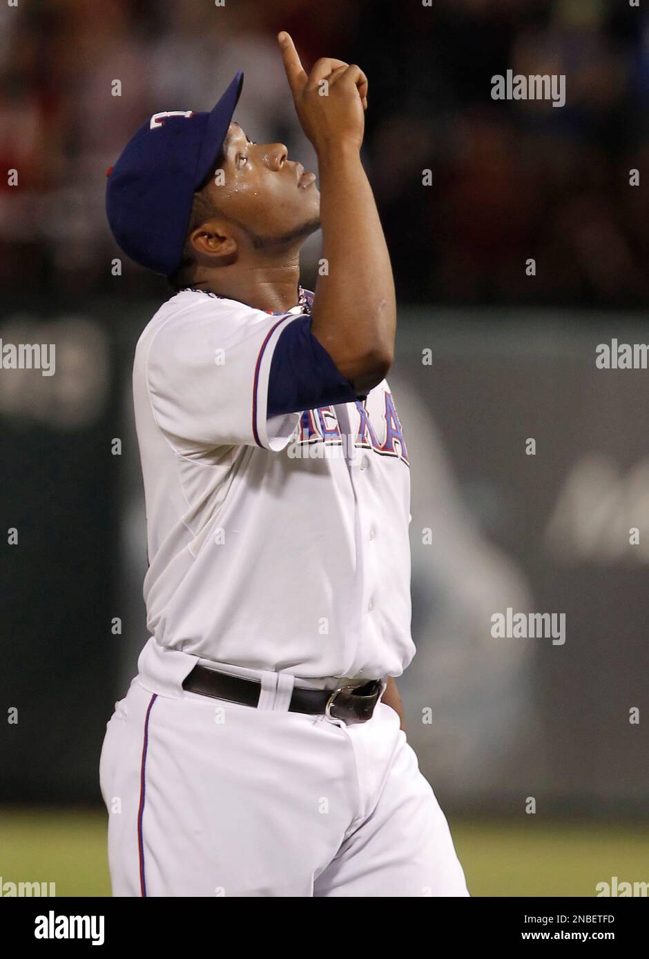 Texas Rangers relief pitcher Neftali Feliz points skyward after closing ...