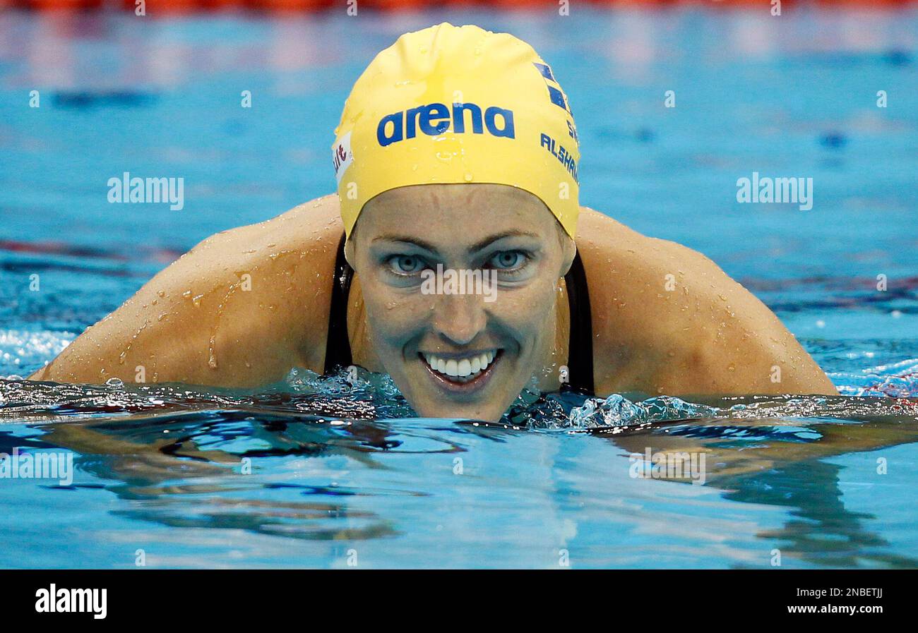 Sweden's Therese Alshammar smiles as she prepares to leave the pool ...