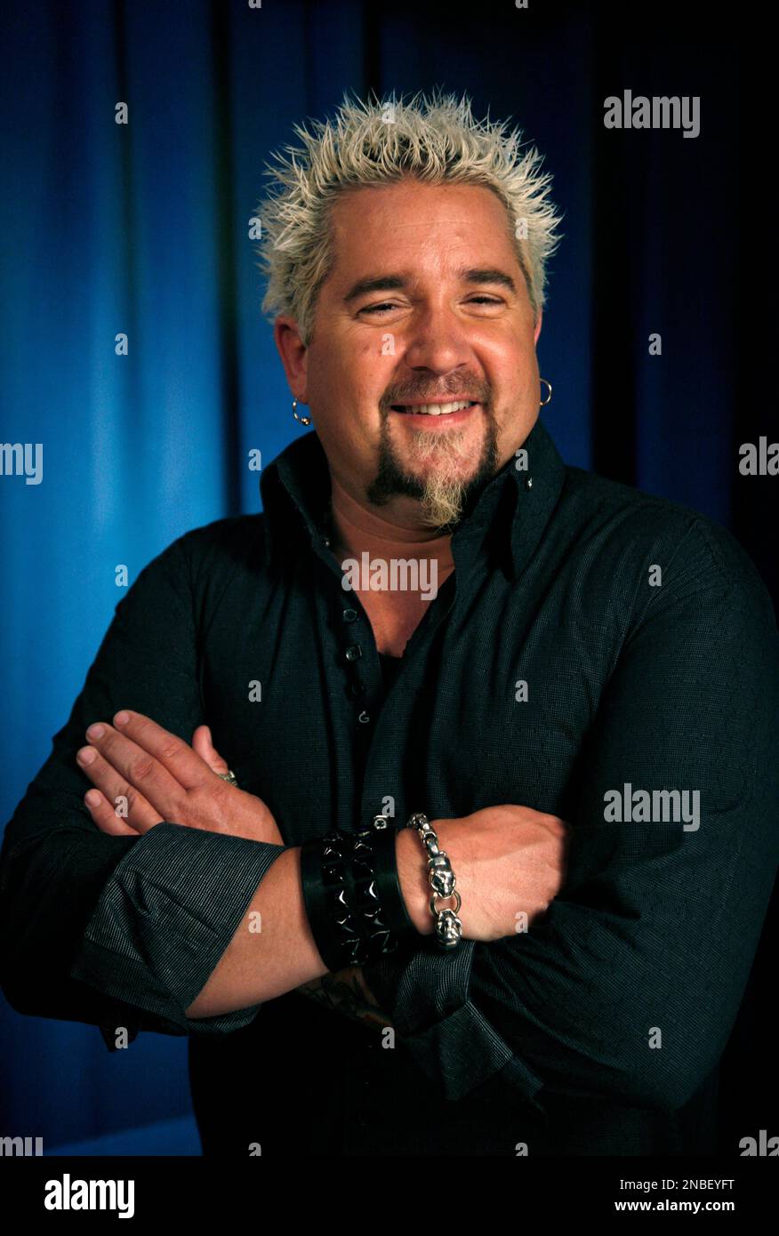 FILE- This Wednesday, May 4, 2011 file photo shows Guy Fieri as he ...