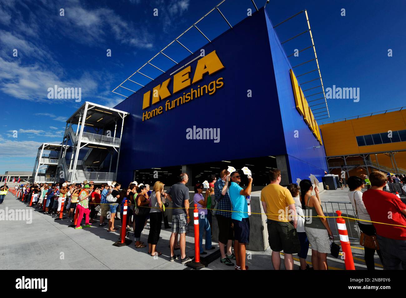Customers wait in line at the IKEA grand opening in the Denver suburb ...