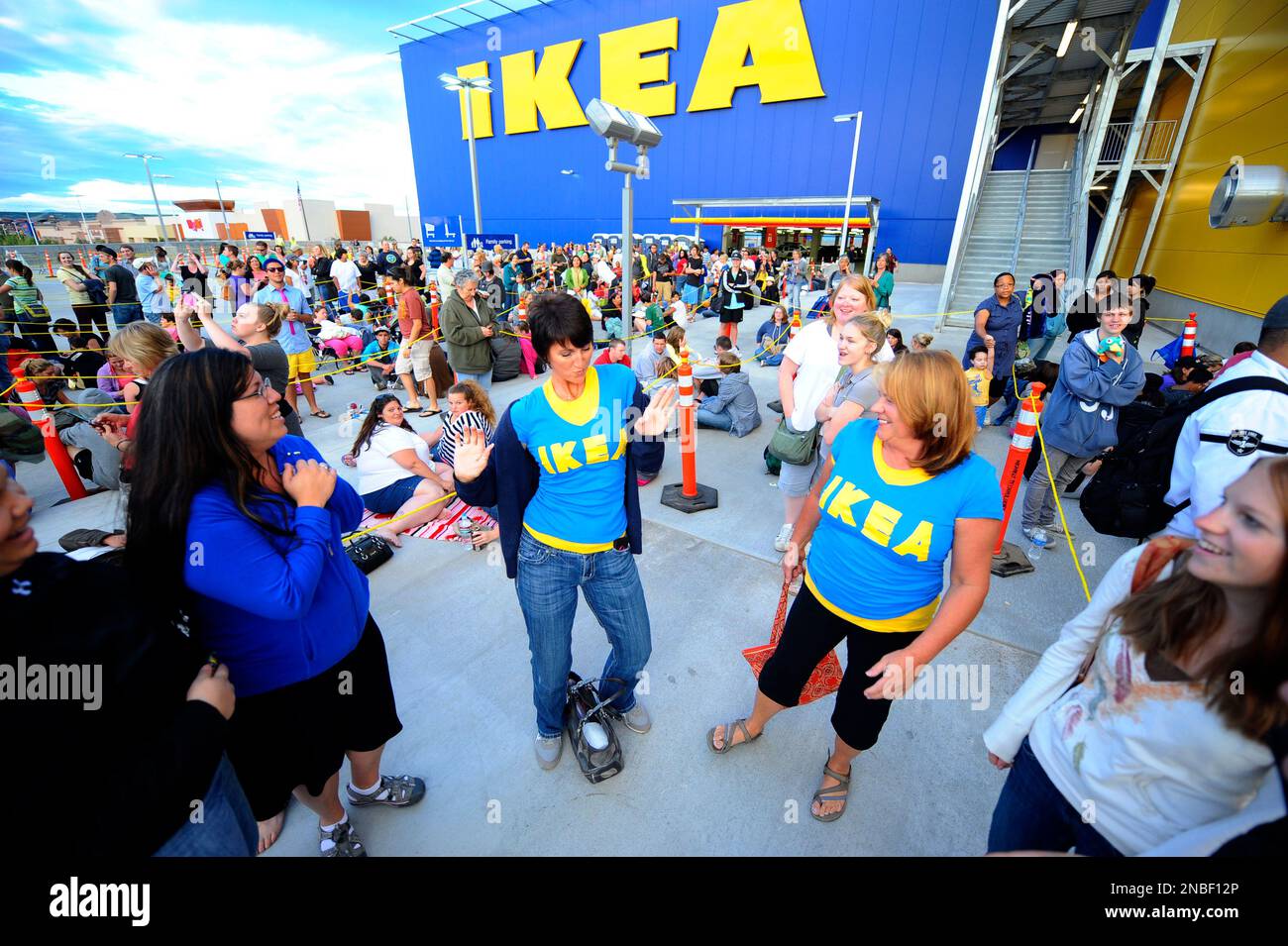 Customers wait in line at the IKEA grand opening in the Denver suburb ...