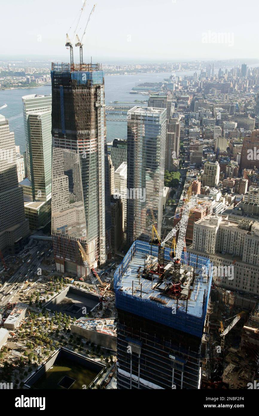 Construction continues on One World Trade Center, left, and Four World ...