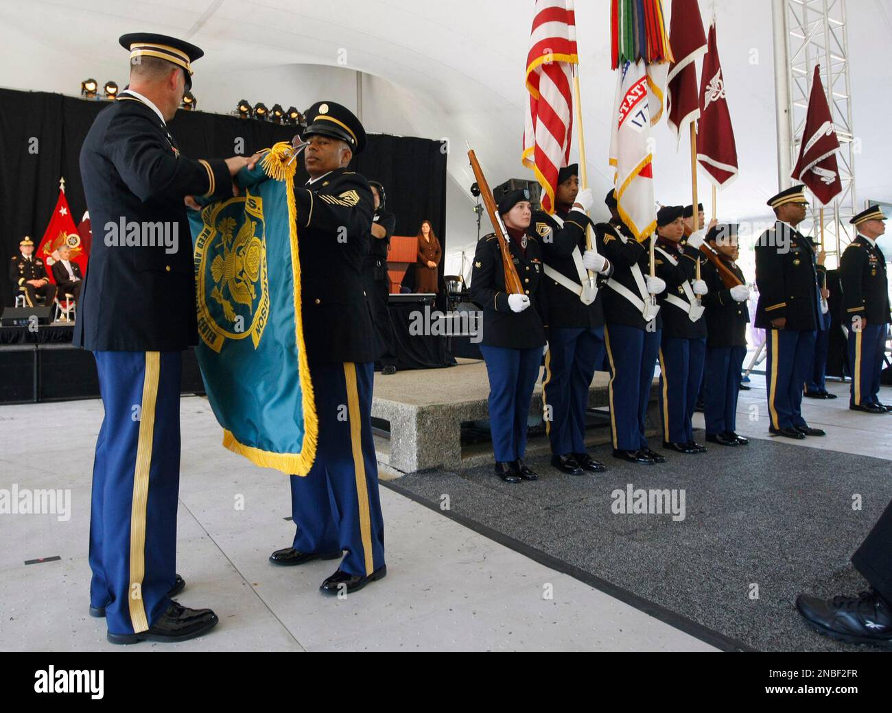Army personnel take part in a flag casing ceremony at Walter Reed Army ...