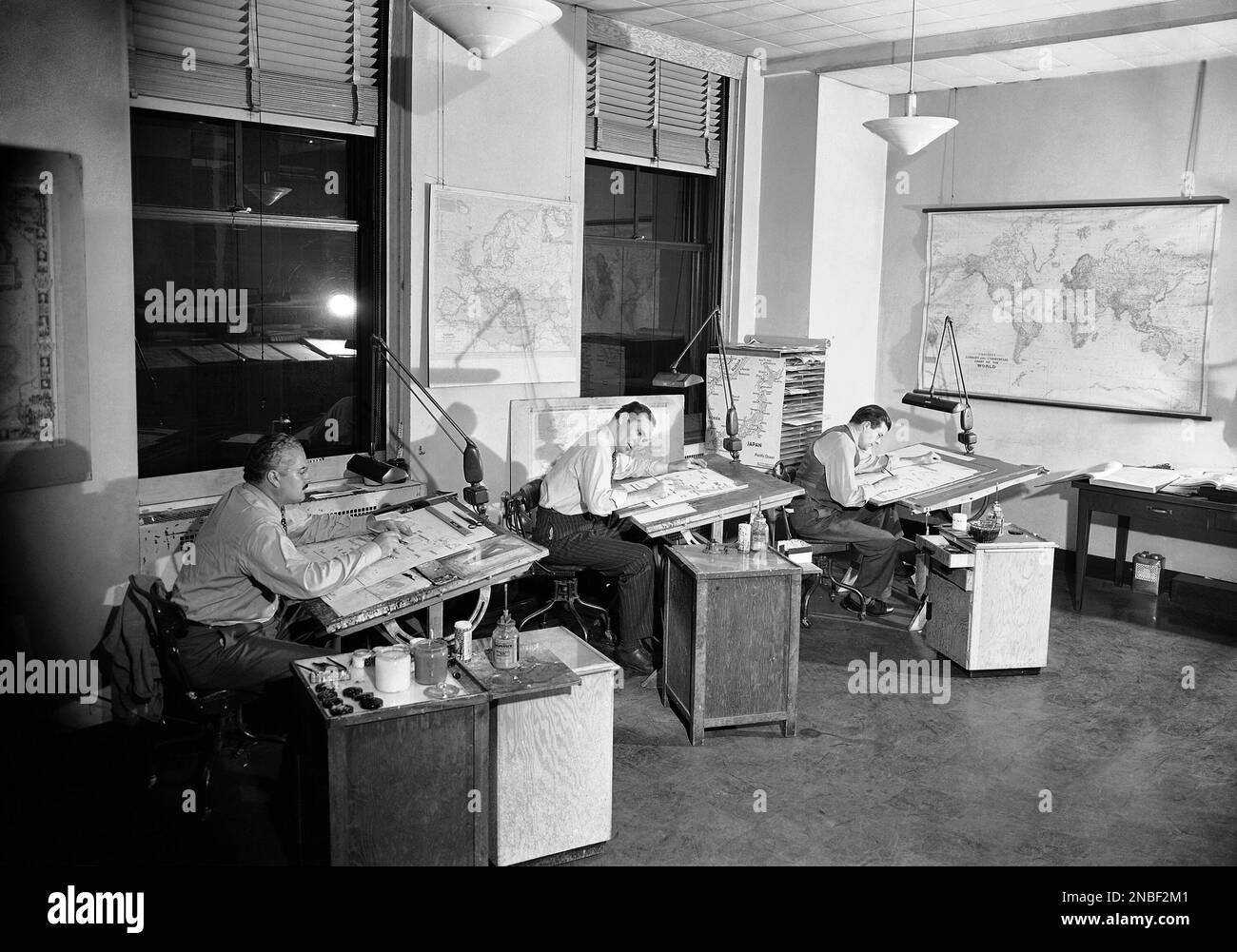 Newsphoto artists making maps and retouching photos on June 1, 1943 ...