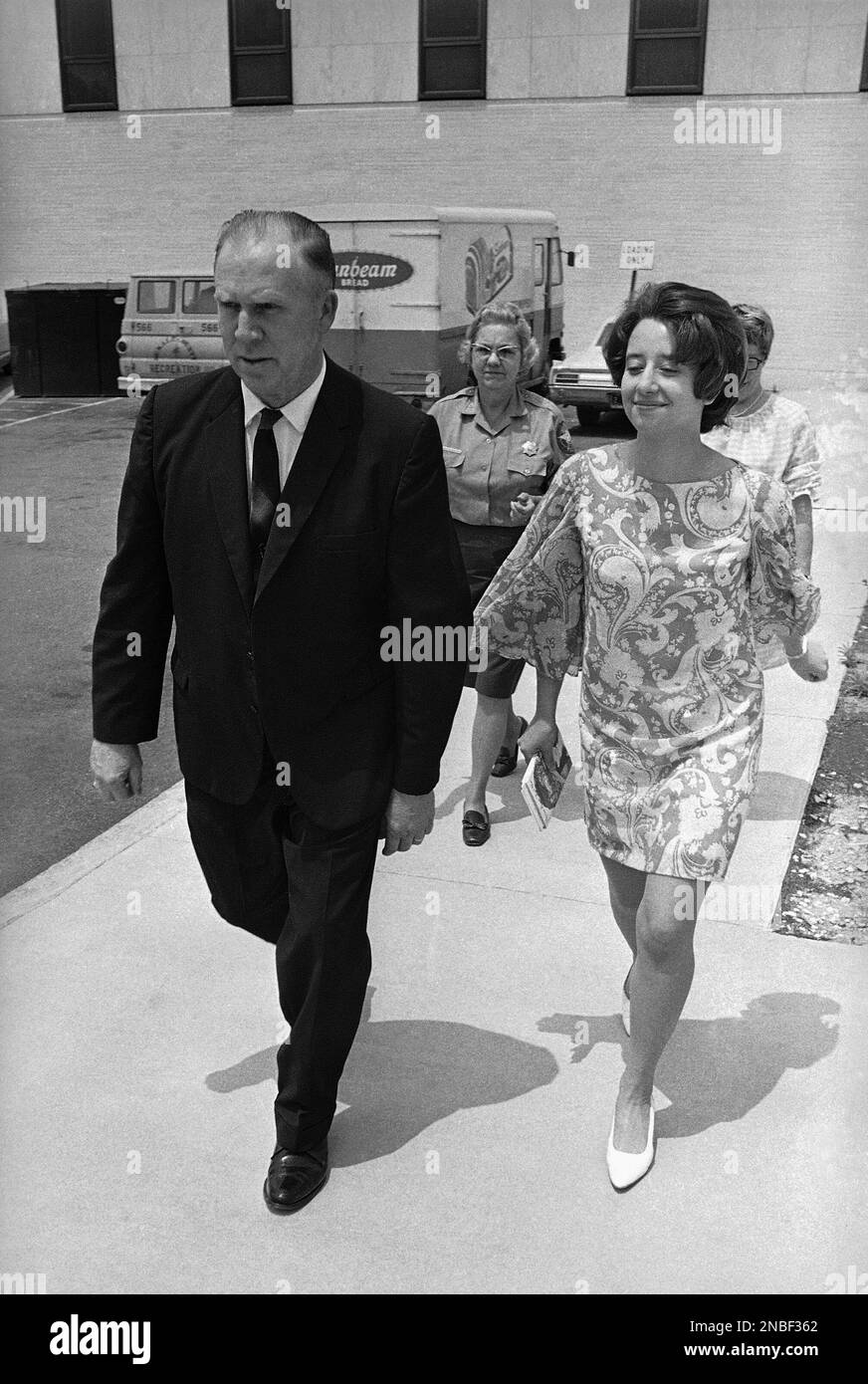 Ruth Eisemann Schier, right, is escorted to the kidnap trial of Gary ...