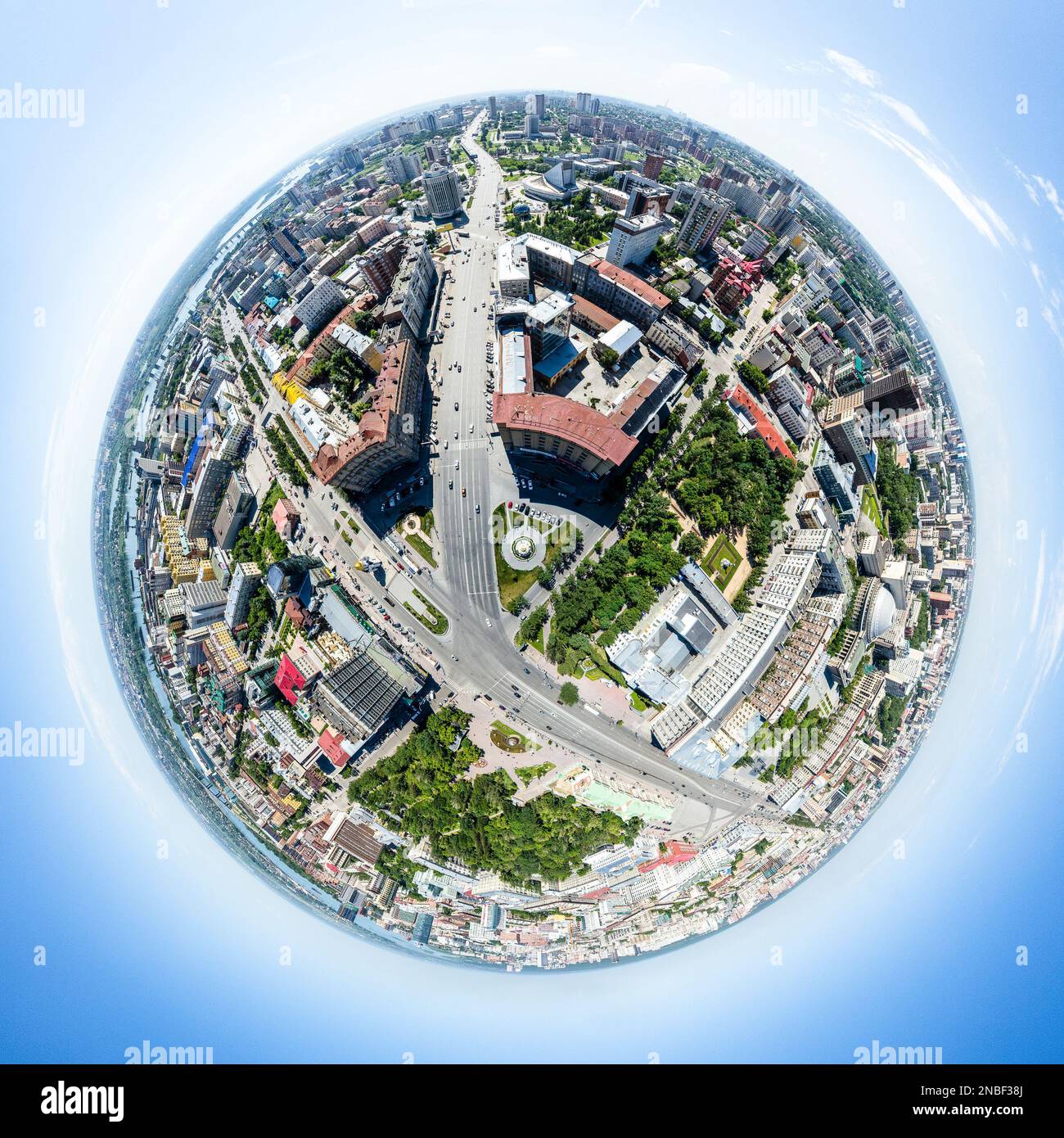 Aerial city view with crossroads, roads, houses, buildings, parks and ...