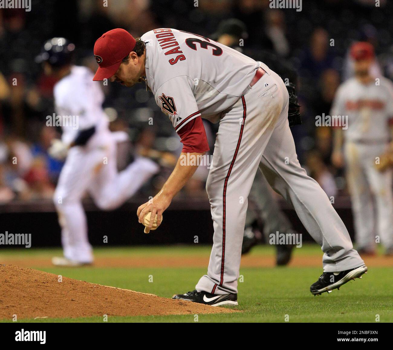Arizona Diamondbacks starting pitcher Joe Saunders grabs the rosin bag ...