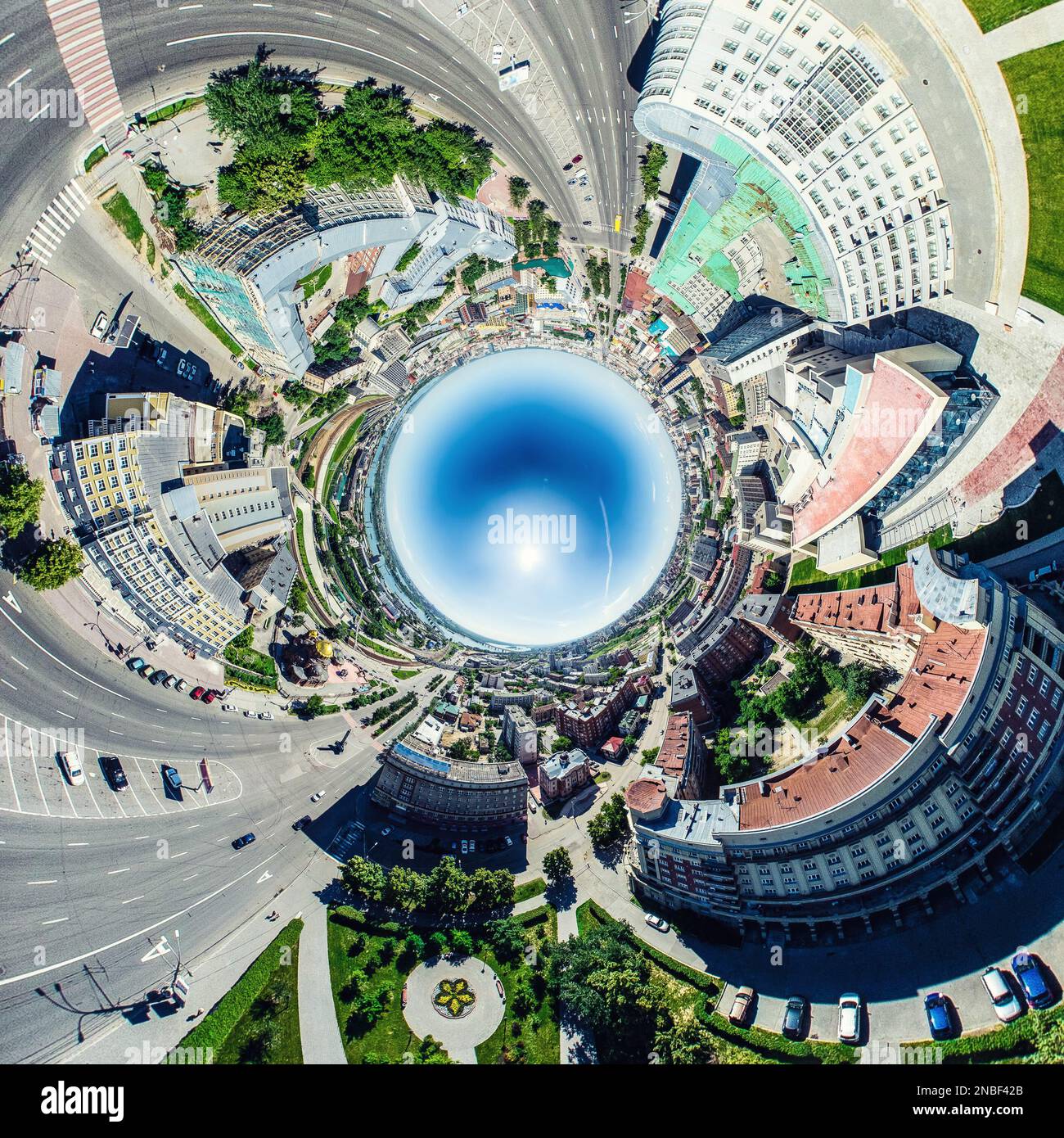 Aerial city view with crossroads and roads, houses, buildings, parks ...