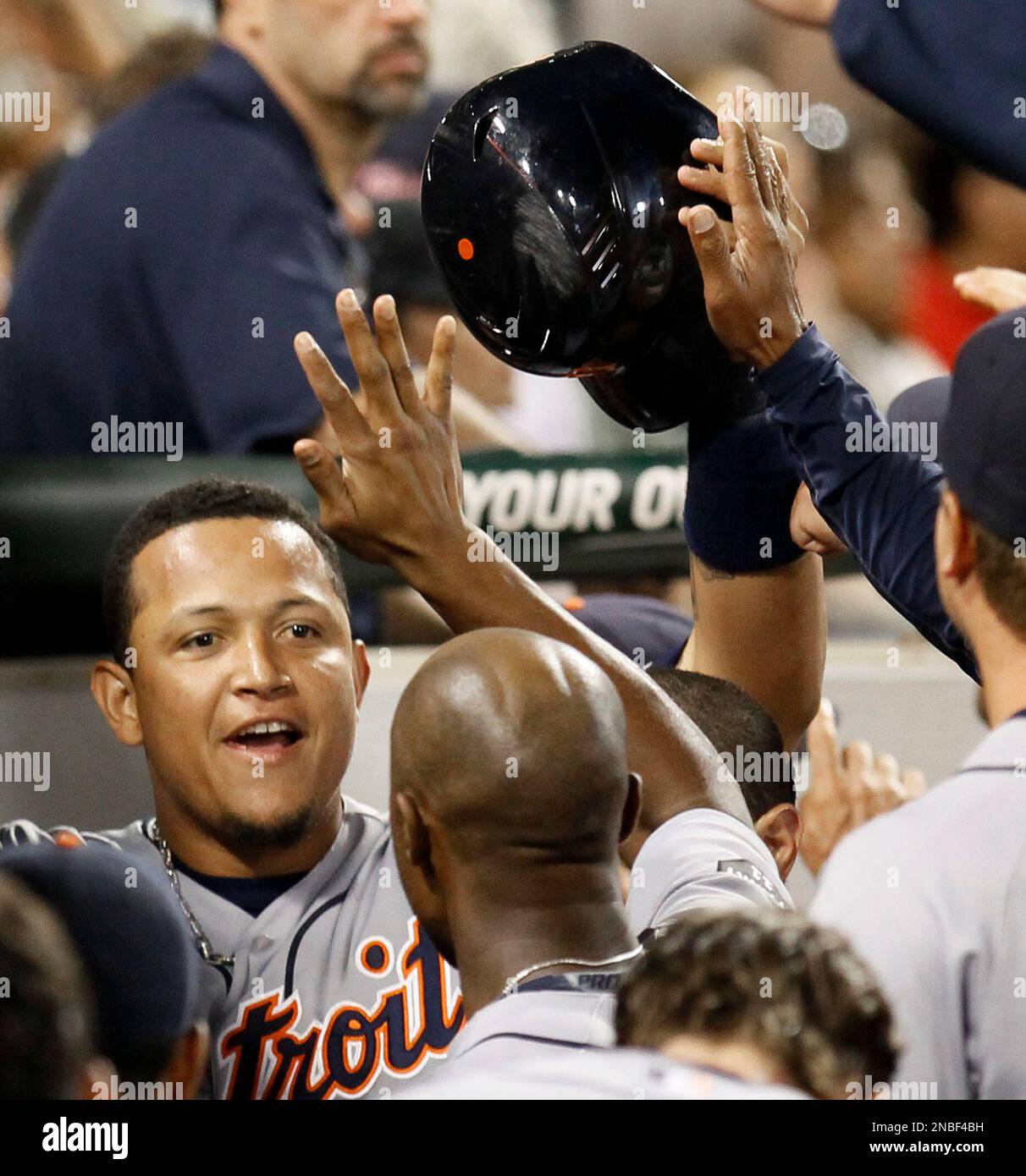 Detroit Tigers' Miguel Cabrera celebrates in the dugout after scoring ...