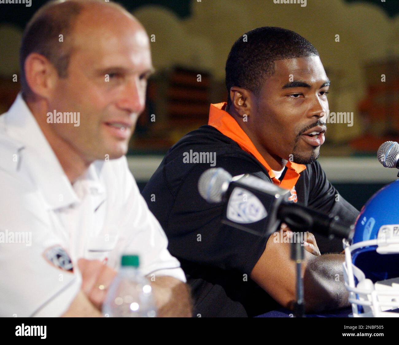 Oregon State head coach Mike Riley, left, and safety Lance Mitchell ...
