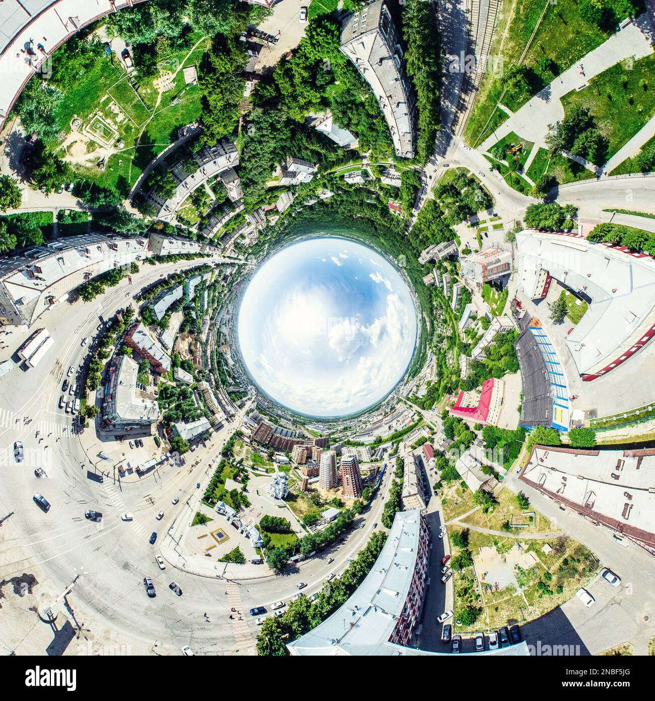 Aerial city view with crossroads and roads, houses, buildings, parks ...