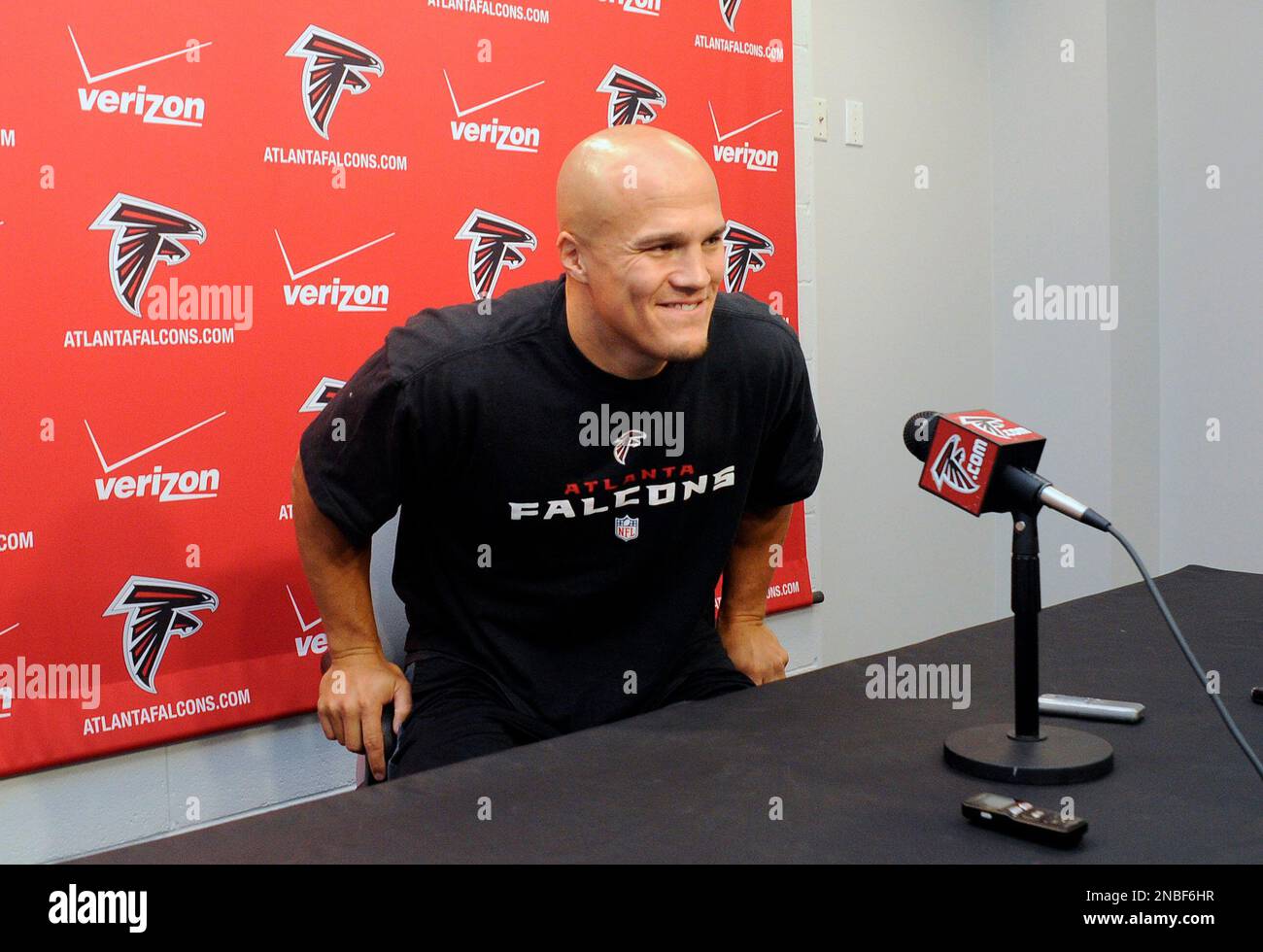 Atlanta Falcons linebacker Coy Wire sits to take questions during a ...