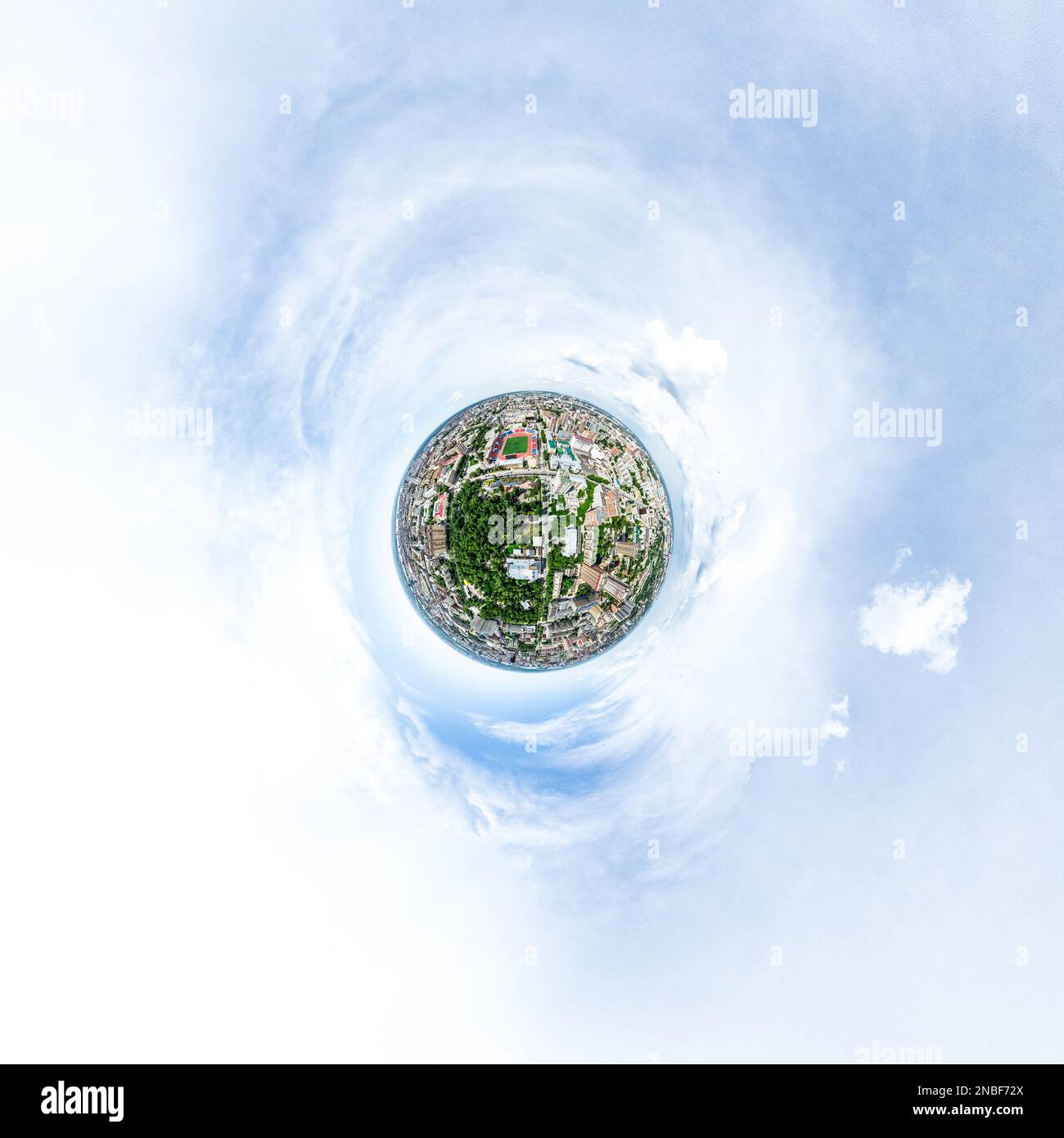 Aerial city view with crossroads and roads, houses, buildings, parks ...