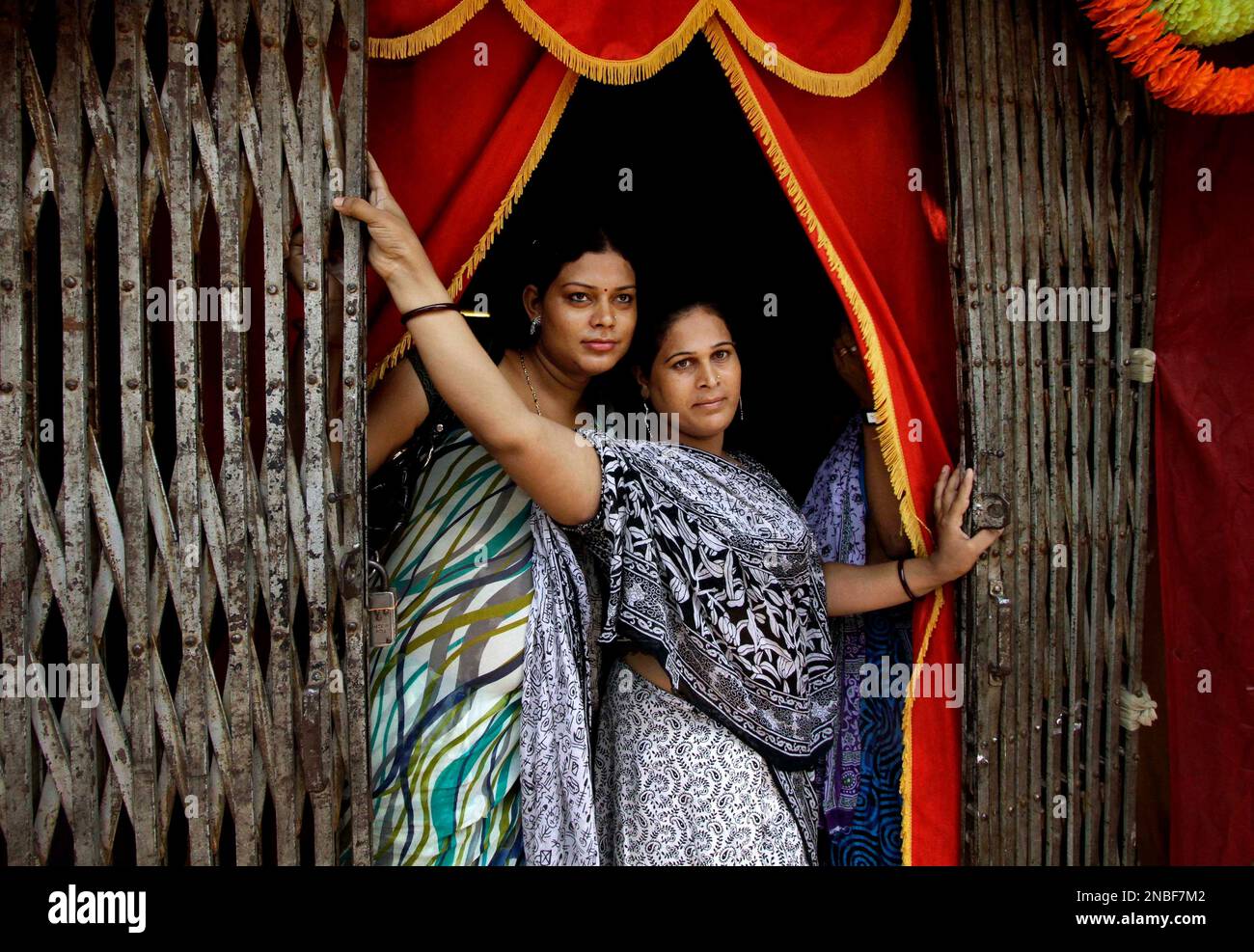 Eunuchs pose at the entrance of the venue of the All India Eunuch ...