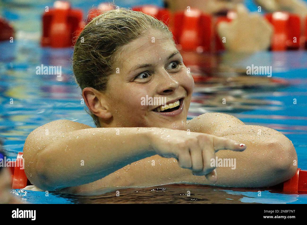 Denmark's Lotte Friis celebrates after winning the women's 1,500m ...