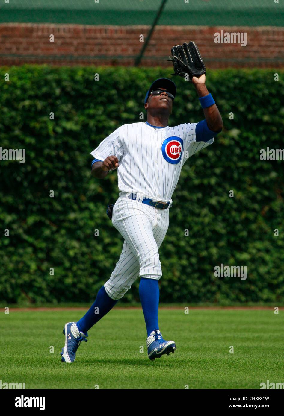 Chicago Cubs left fielder Alfonso Soriano catches a fly ball hit by ...