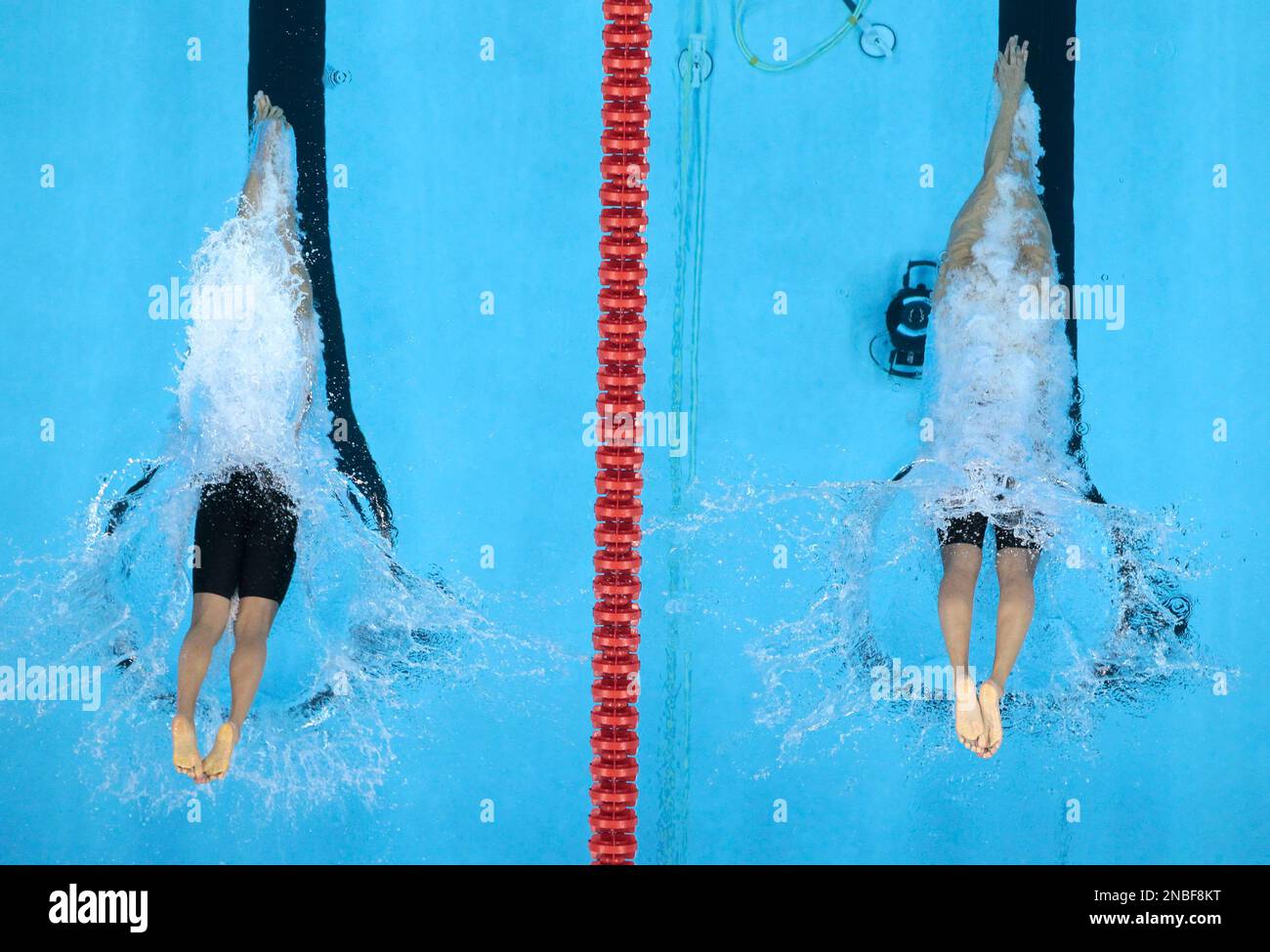 Japan's Hanae Ito, left, and Haruka Ueda start their women's 200m ...