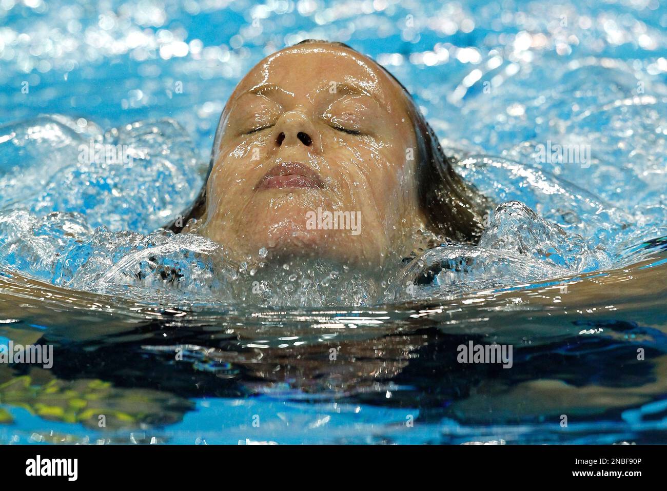 Italy's Federica Pellegrini emerges from the water after competing her ...