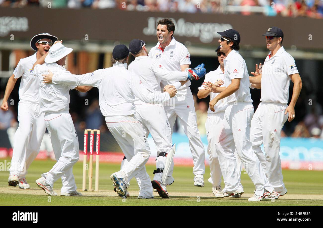 England's James Anderson, centre, celebrates after taking the wicket of ...