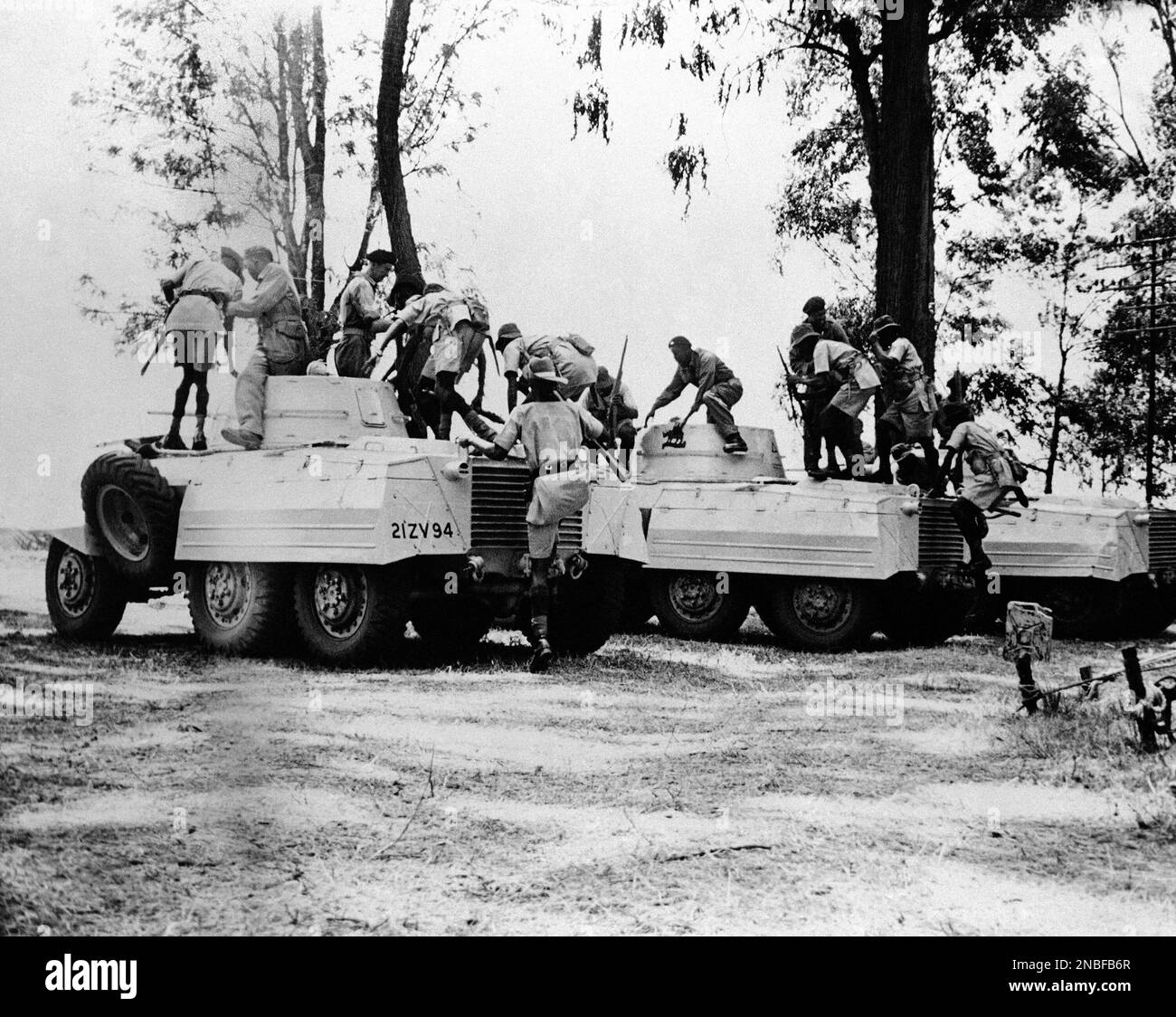 Troops of the Fifth Battalion King’s African rifles climb aboard ...