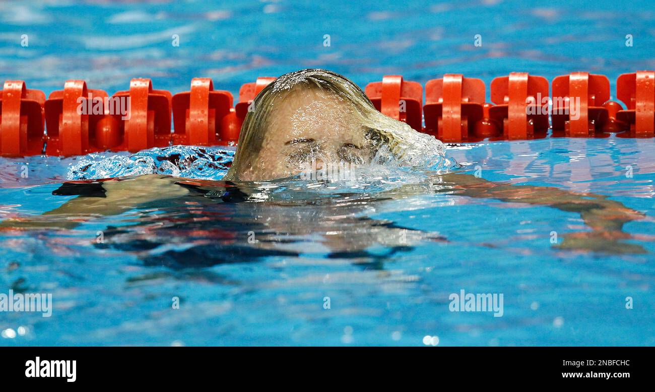 South Africa's Karin Prinsloo emerges from the water after completing ...
