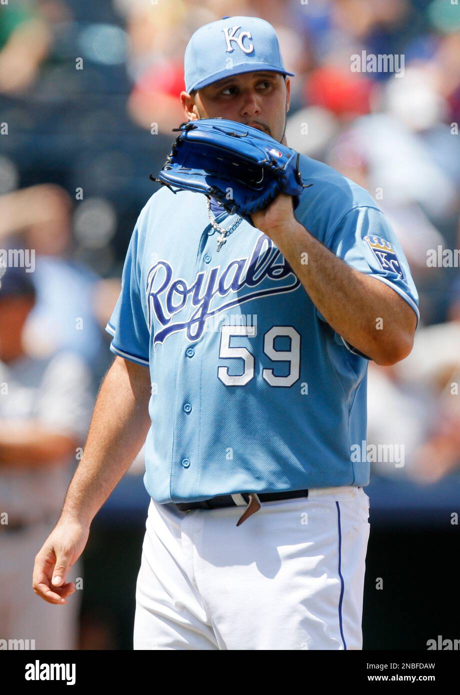 Kansas City Royals starting pitcher Felipe Paulino heads to the dugout ...