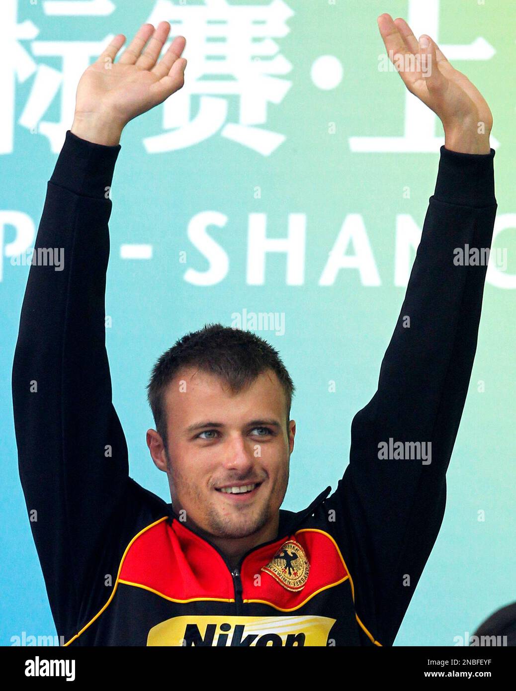 Bronze medalist Germany's Sascha Klein celebrates at the medal ceremony ...