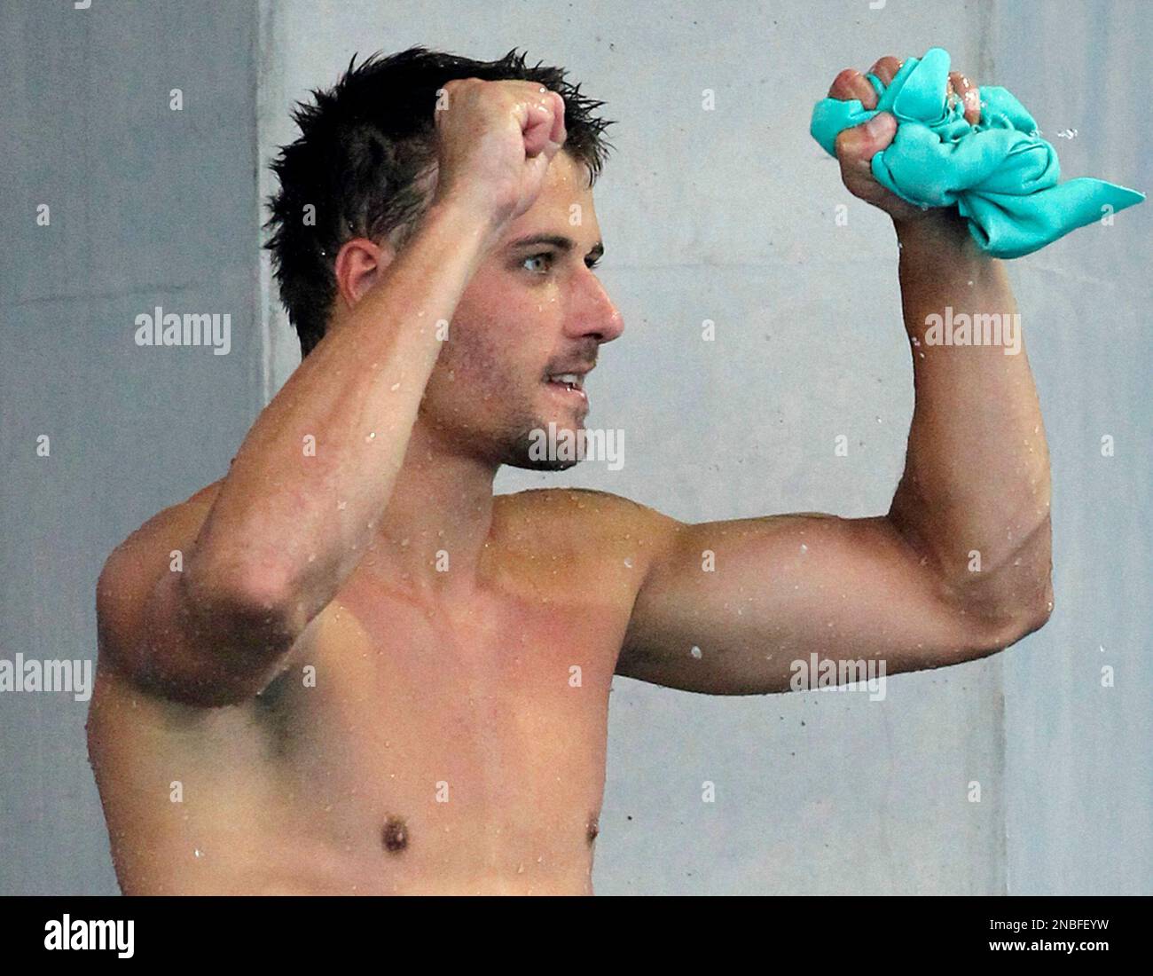 Bronze medalist Germany's Sascha Klein celebrates after his final jump ...