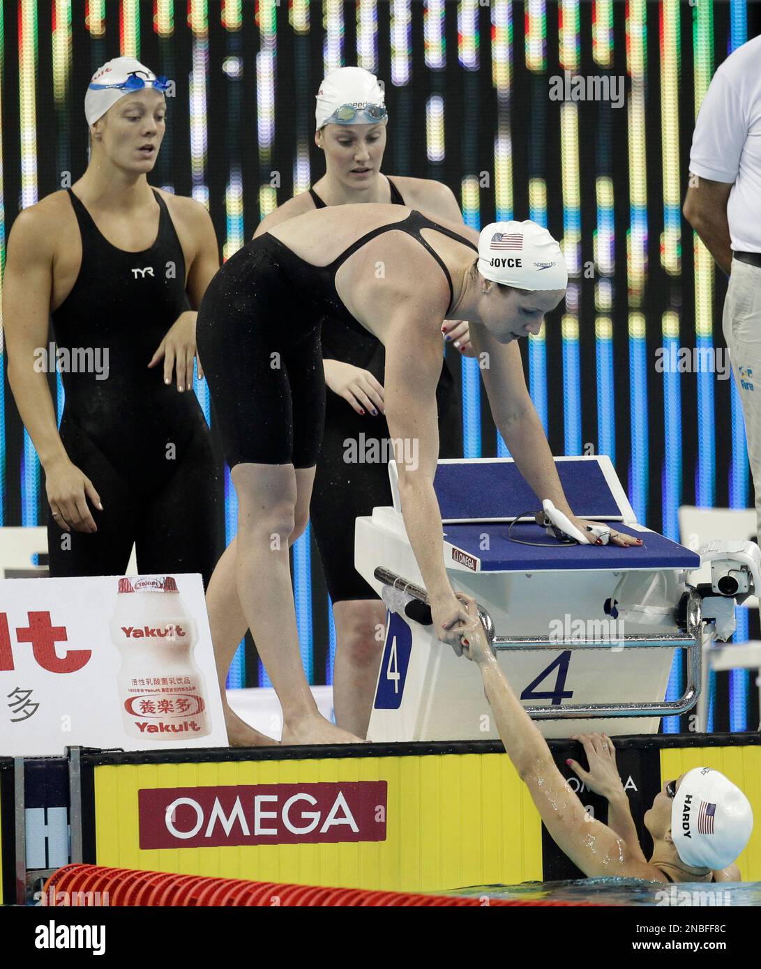 The U.S. women's relay team's Joyce Franklin congratulates Jessica ...