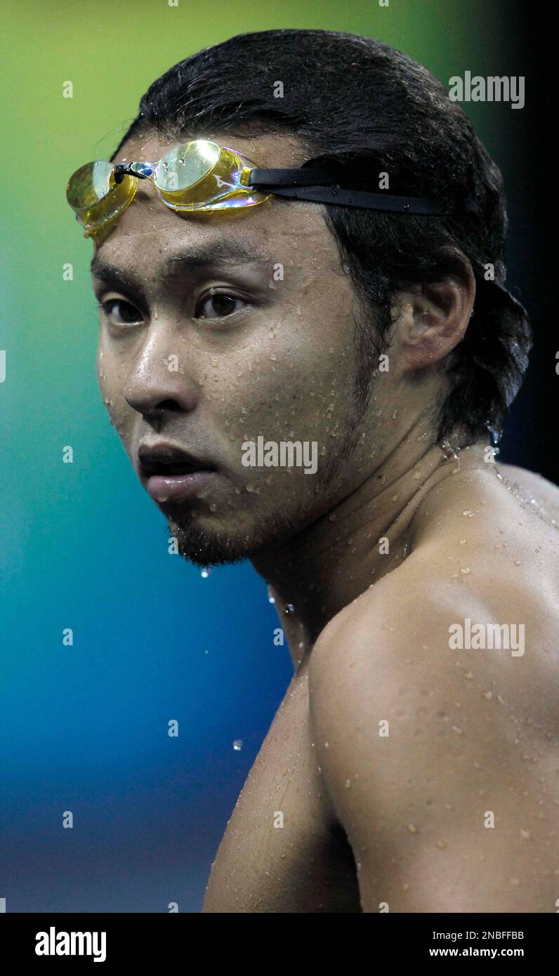 Japan's Kosuke Kitajima looks on after a men's 100m Breaststoke heat, at the FINA Swimming World ...
