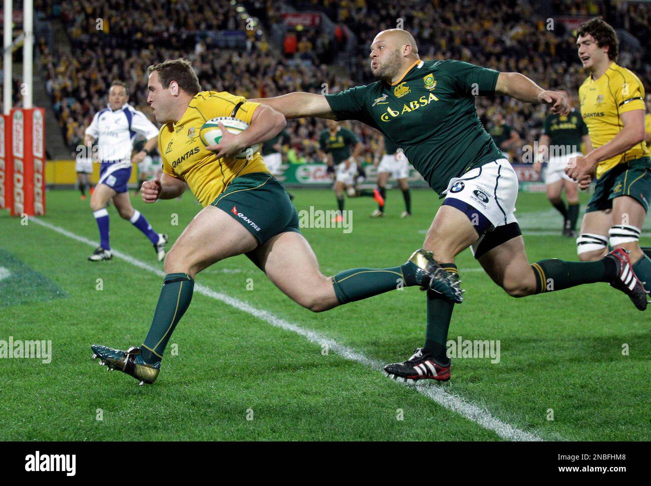 South africa's CJ van der Linde, right, chasses Australia's Ben ...