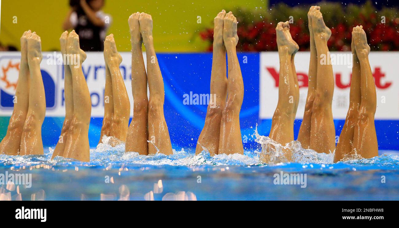 The French team compete in the synchronised swimming Teams Free event ...