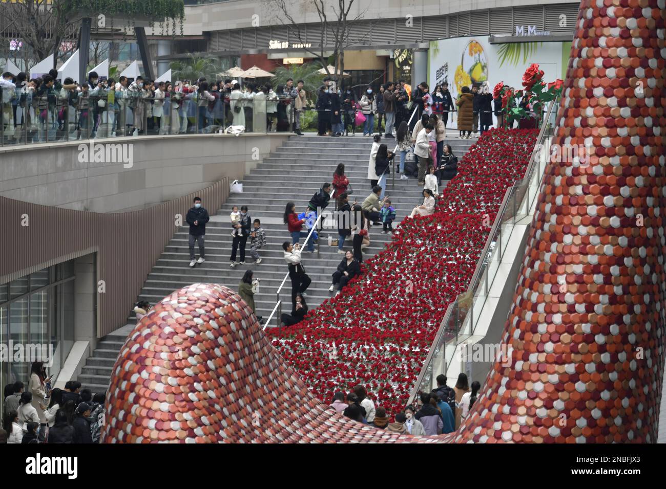 Stairs covered with 10,000 roses attract people to take photos in a ...