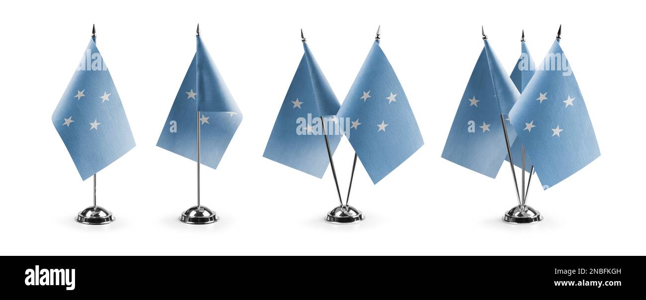 Small national flags of the Federated States Micronesia on a white ...